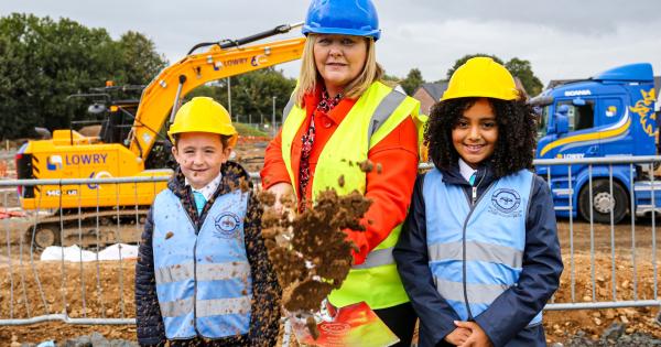 McIlveen cuts first sod for new primary school in Limavady - Alpha ...